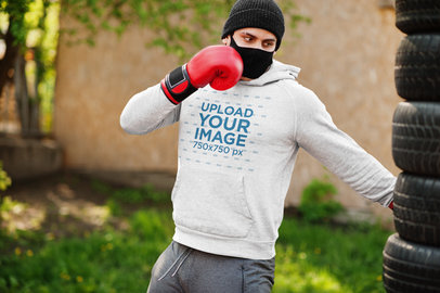 Placeit - Heathered Hoodie Mockup Featuring a Man Boxing