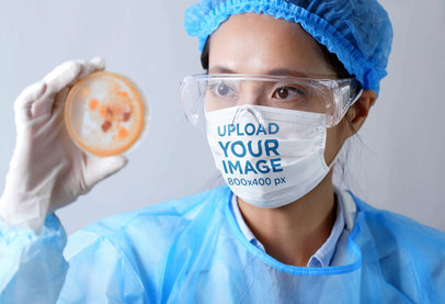 Placeit - Face Mask Mockup of a Scientist Examining a Sample