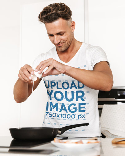 Placeit - V-Neck T-Shirt Mockup of a Man Cooking Breakfast