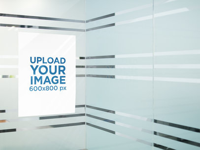 Placeit - Poster Mockup on a Decorated Office Glass