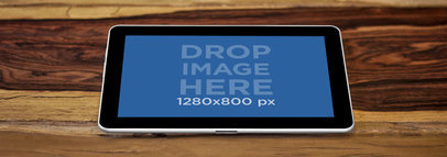Placeit - Wide Mockup of a Samsung Galaxy Tablet on a Table