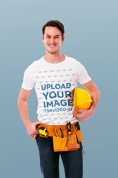 Placeit - Round-Neck Tee Mockup of a Smiling Worker Holding a ...