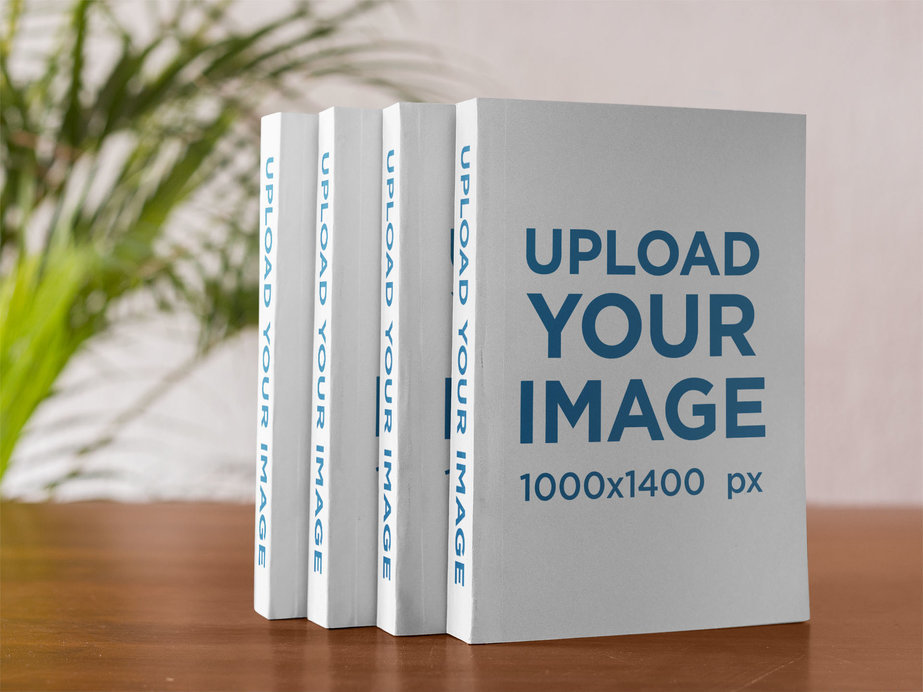 Placeit - Four Books Mockup Standing on a Wooden Table
