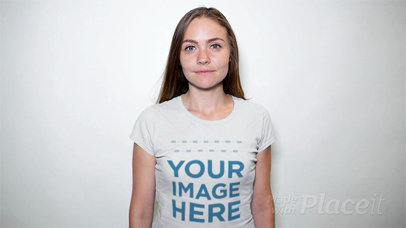 Placeit - Stop Motion of a Woman Wearing a Round Neck Tee in a Studio