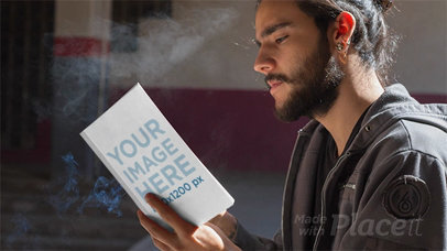 Placeit - Bearded Man Smoking While Reading a Book in Stop Motion
