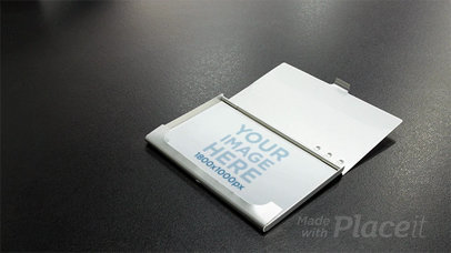 Placeit - Stop Motion of a Business Card in a Card Holder on a Black ...