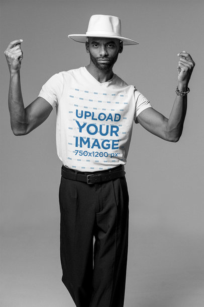 Placeit - V-Neck T-Shirt Mockup of a Man Snapping His Fingers at a Studio