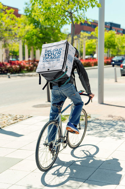Placeit - Mockup of a Man Carrying a Delivery Backpack in the City