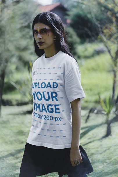 Placeit - Oversized Tee Mockup of a Woman with Dark Forest-Inspired Makeup