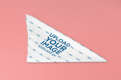 Placeit - Mockup of a Sublimated Bandana Placed Over a Colorful Surface