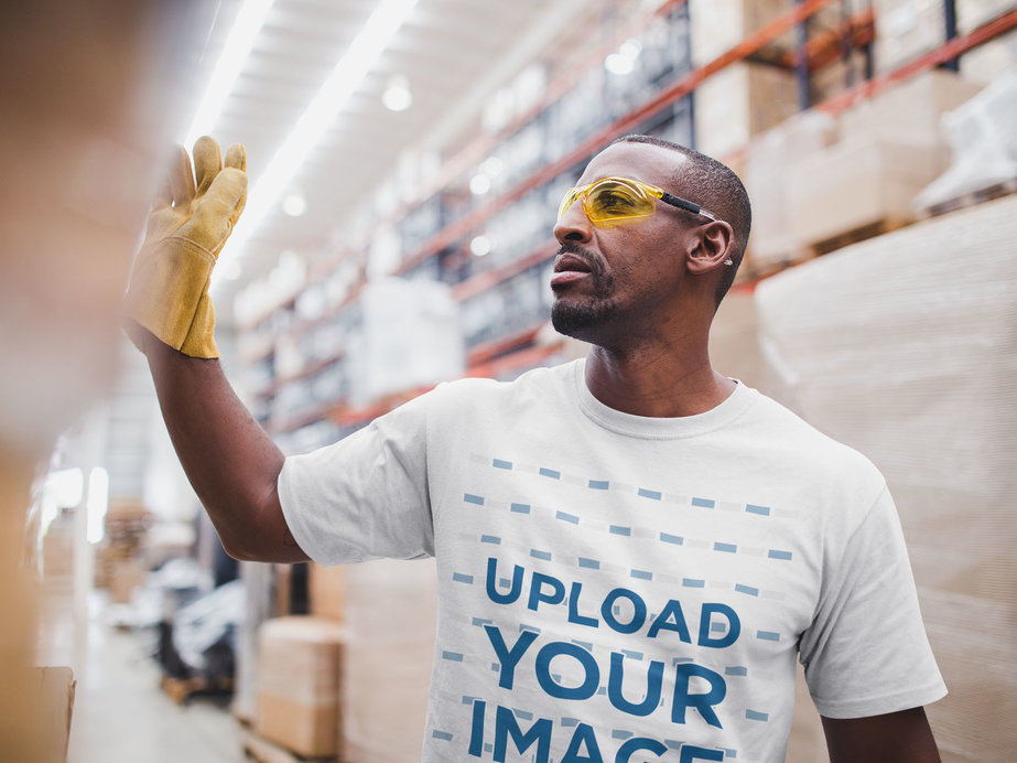 Placeit - Warehouse Worker Wearing a T-Shirt Mockup