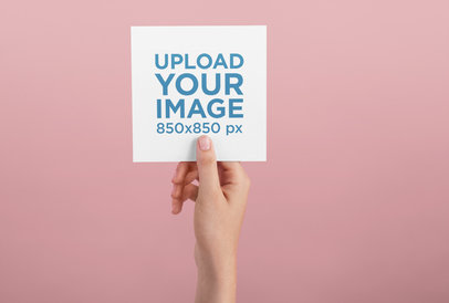 Placeit - Postcard Mockup of a Female Hand Holding a Square Postcard ...