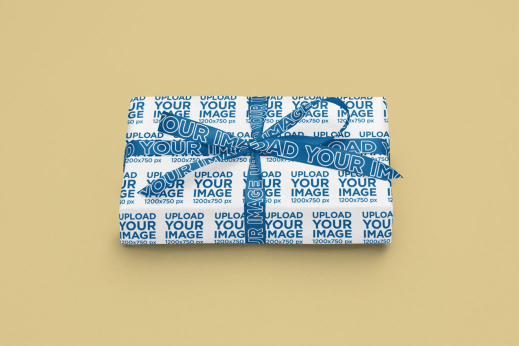 Placeit - Gift-Themed Mockup Featuring a Wrapping Paper and a Ribbon