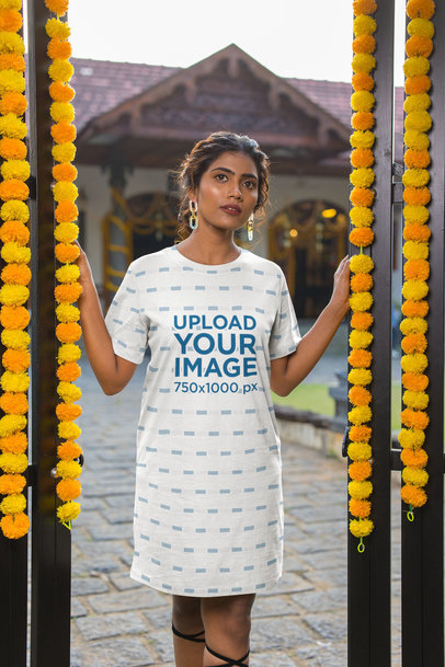 Placeit - T-Shirt Dress Mockup of a Woman Posing by a Floral-Decorated ...