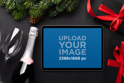 Placeit - Christmas-Themed Mockup of an iPad Placed Next to a Bottle of ...