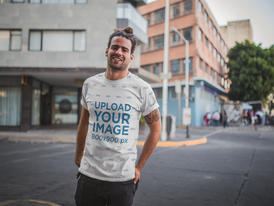 Placeit - Sublimated Tee Mockup Featuring a Happy White Man on the Street