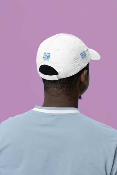 Placeit - Back-View Dad Hat Mockup of a Man Standing in a Studio