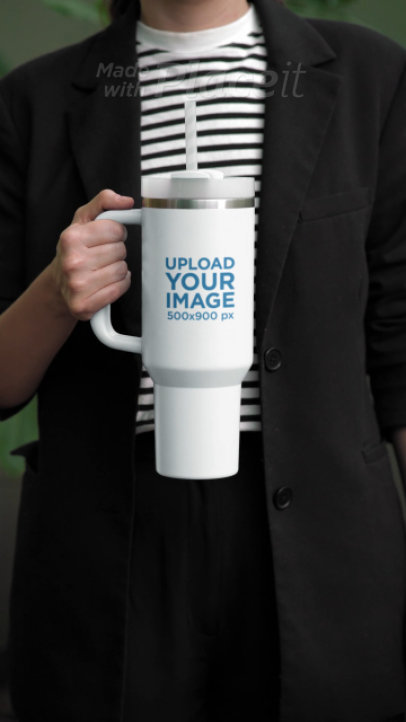 Placeit - Video of a Woman Holding a Stanley Tumbler