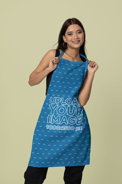 Placeit - Kodenipr Club Apron Mockup of a Happy Woman in a Studio ...