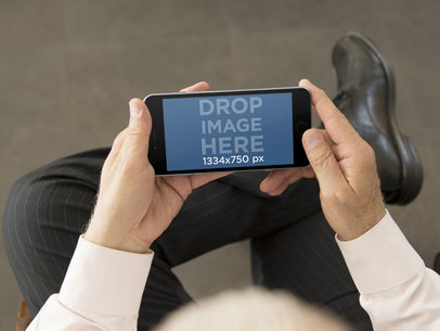 Placeit - Mockup of Elderly Man With iPhone 6 Plus