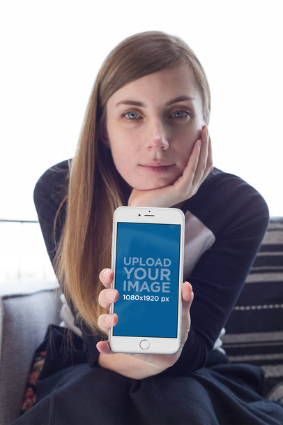 Placeit - Mockup of a Blonde Woman Showing her iPhone 8 Plus