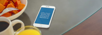 Placeit - iPhone 6 Mockup of an iPhone Lying on Top of a Crystal Dining ...