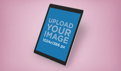 Placeit - Render Mockup of an iPad Pro Floating Over a Solid Surface