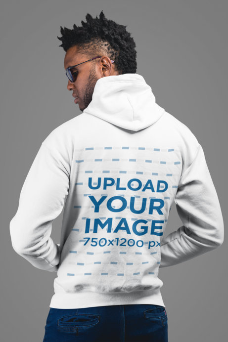 Placeit - Back View Mockup of a Man Wearing a Hoodie and Sunglasses