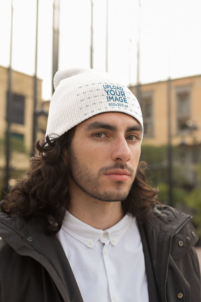 Placeit - Beanie Mockup Featuring a Serious Handsome Man in Winter