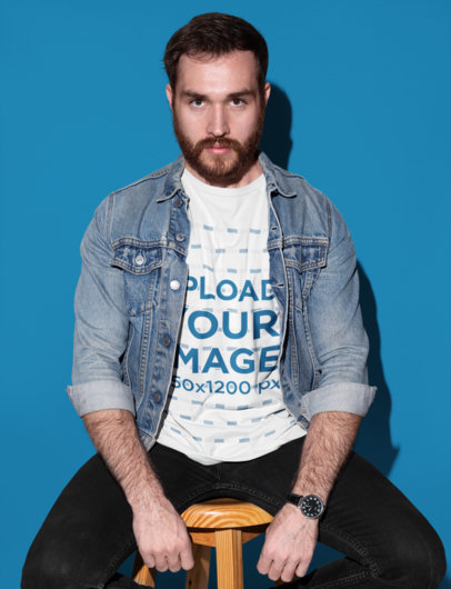 Placeit - Tshirt Mockup of a Man Sitting on a Wooden Stool