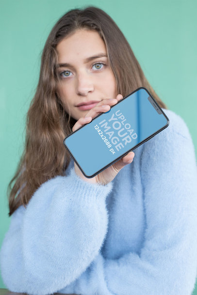 Placeit - Mockup of a Beautiful Woman Showing an iPhone 11 Pro Max