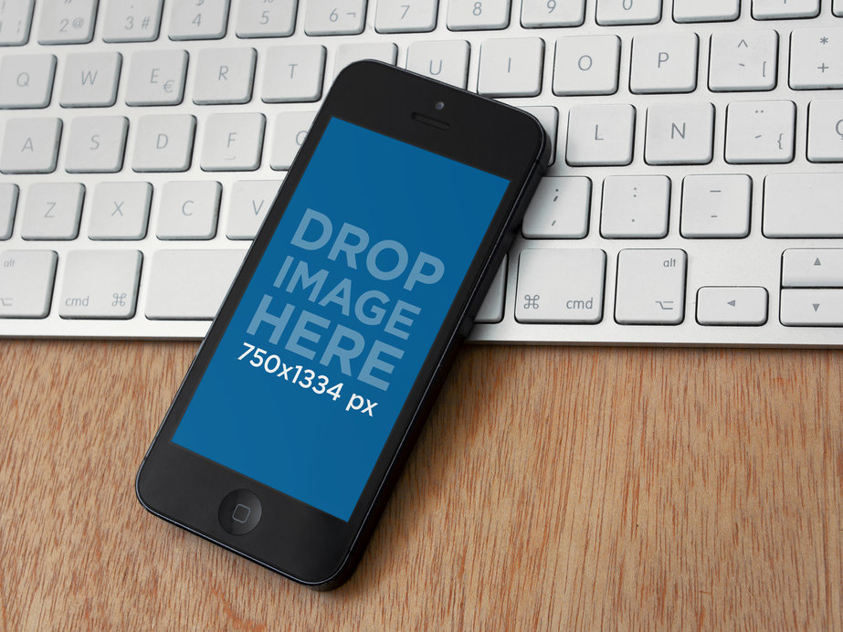 Placeit - iPhone Mockup Featuring a Computer Keyboard