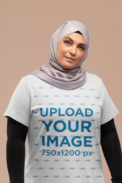 Placeit - T-Shirt Mockup of a Woman with a Hijab at a Studio