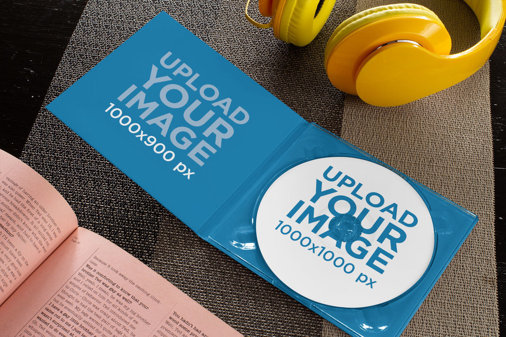 Placeit - Digipak Mockup with a CD and Headphones