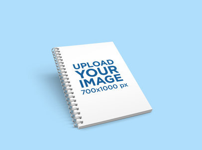 Placeit - Mockup of an A5 Spiral Notebook Floating over a Minimalist ...