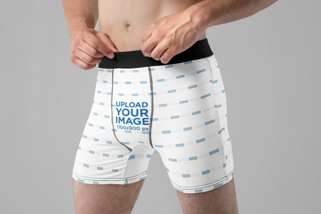 Placeit - Mockup of a Man With Boxers in the Studio