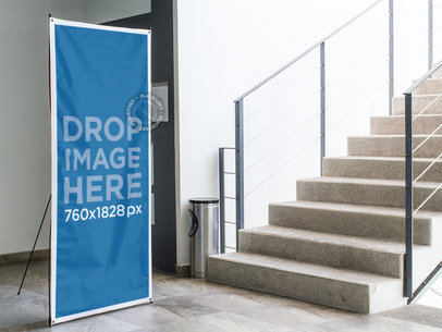 Placeit - Vertical Banner Mockup Standing Next to a Stairway
