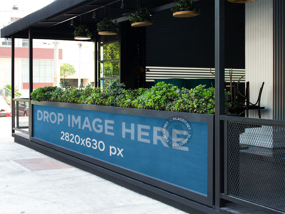 Placeit - Horizontal Banner Mockup in the Street Outside a Bar