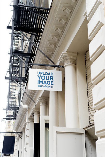 Placeit - Mockup of a Shop Sign on an Elegant Building