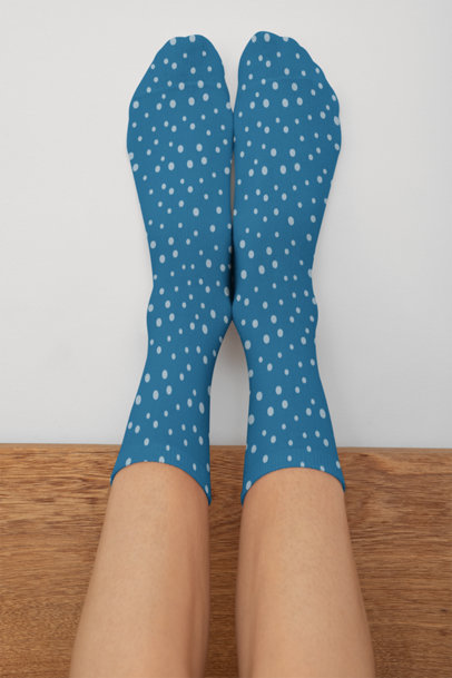 Placeit - Mockup of A Woman Upside-Down Wearing Sublimated Socks