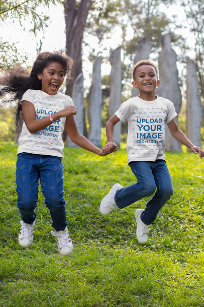 Placeit - T-Shirt Mockup of a Boy and a Girl Playing at a Park