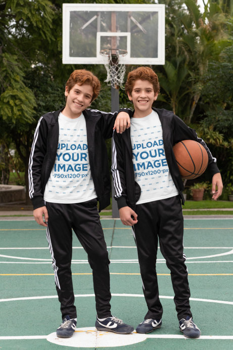 Placeit - T-Shirt Mockup Featuring Red-Haired Twins at a Basketball Court Placeit - T-Shirt Mockup Featuring Red-Haired Twins at a Basketball Court