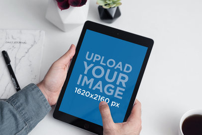 Placeit - Mockup of a Pair of Hands Holding an iPad in a Minimalistic ...
