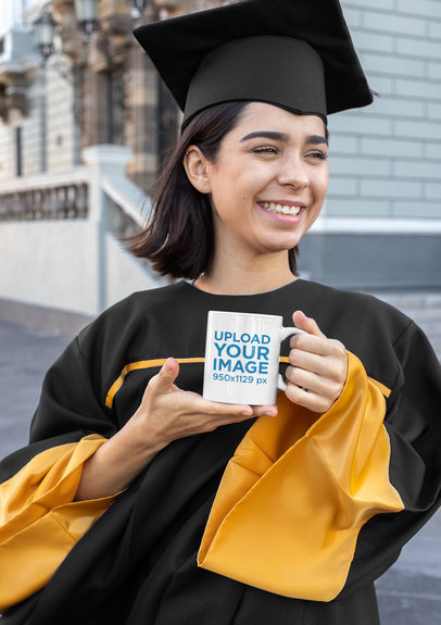 Placeit - 11 oz Coffee Mug Mockup of a Woman on Graduation Day
