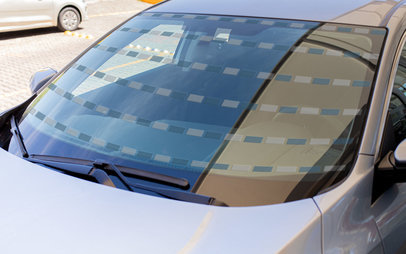 Placeit - Window Decal Mockup Featuring the Windshield of a Car