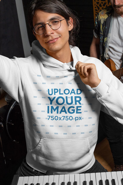 Placeit - Pullover Hoodie Mockup of a Musician with a Keyboard