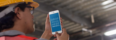 Placeit - Mockup of a Male Architect Holding His iPhone 6 Plus in ...