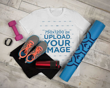 Placeit - T-Shirt Mockup of a Fitness Outfit Featuring Exercising Equipment