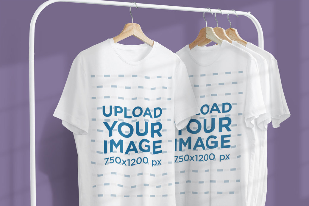 Placeit - Mockup Featuring Two Customizable T-Shirts Hanging From a ...