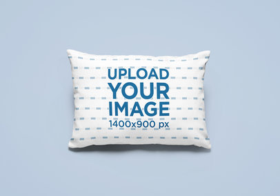 Placeit - Flat Lay Mockup of a Sublimated Pillow on a Flat Surface